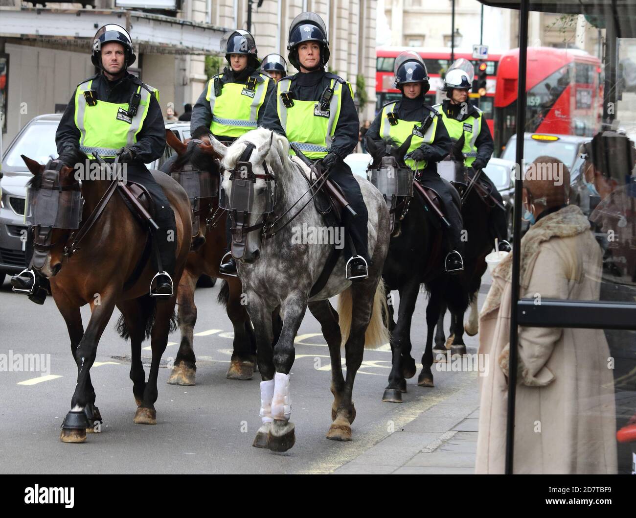 Mounted Police head along Whitehall.With a number of expected ...