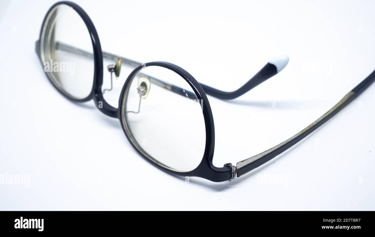 Fixed a broken eye glasses leg with rod object isolated on white ...