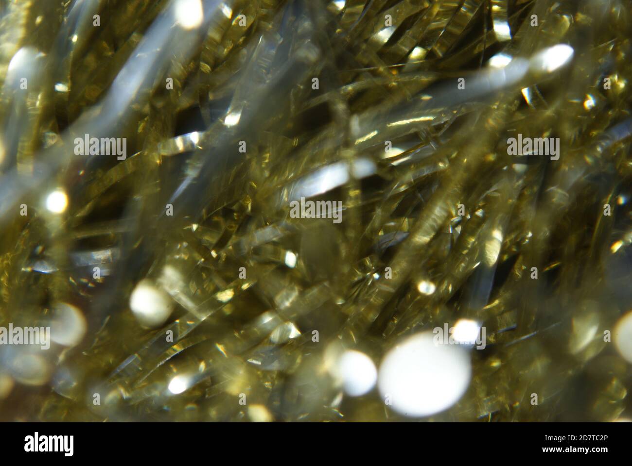 Closeup yellow tinsel texture hi-res stock photography and images - Alamy
