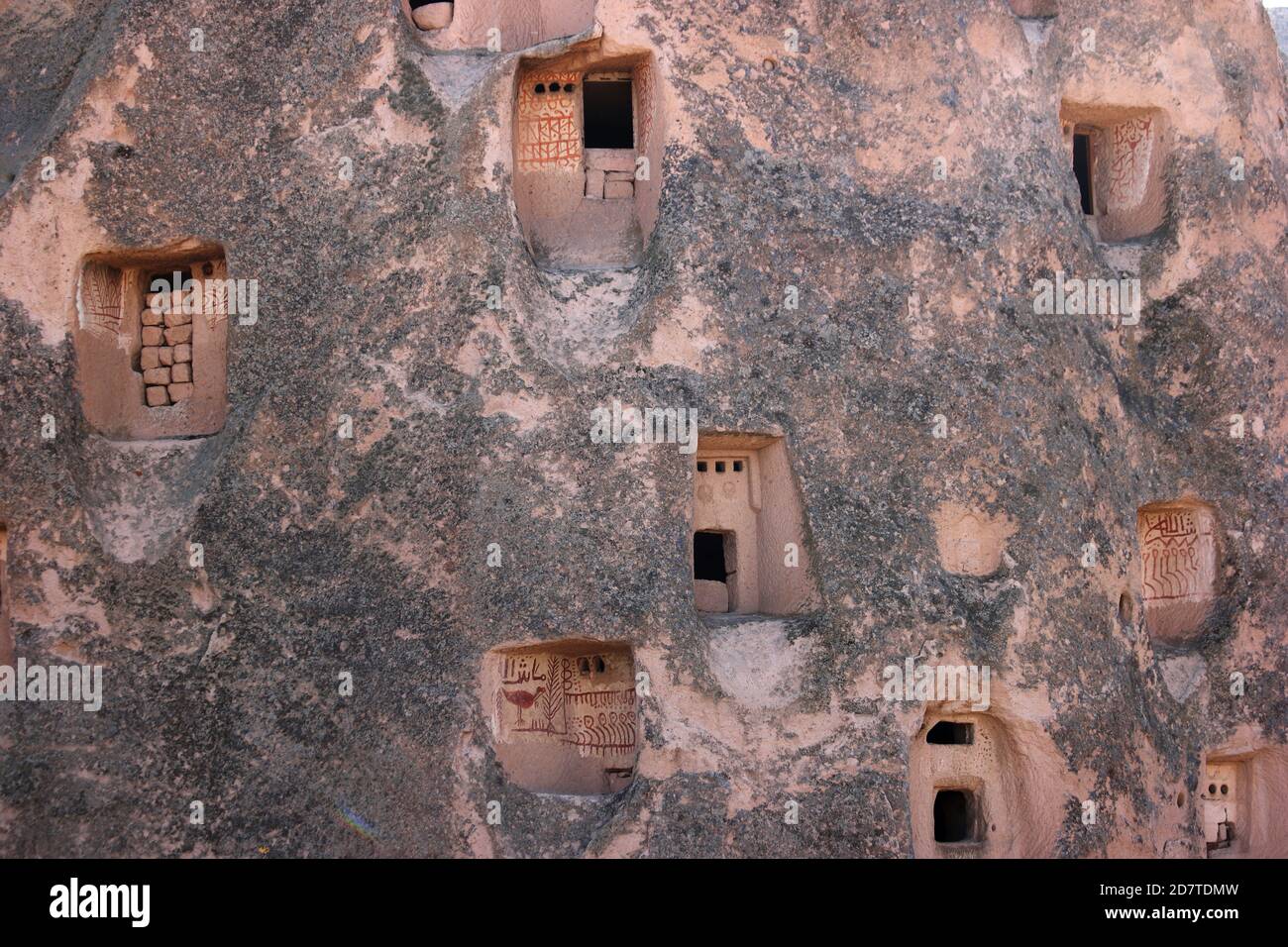Ancient cave houses carved in volcanic tuff Stock Photo - Alamy