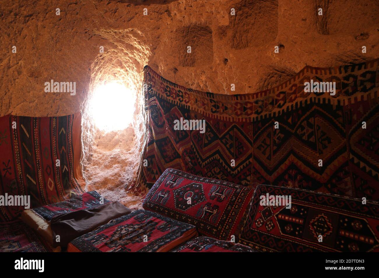 Interior of cave house in tuff rock formation Stock Photo - Alamy