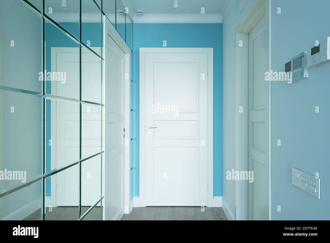 Doors by the mirror inside of the flat Stock Photo - Alamy