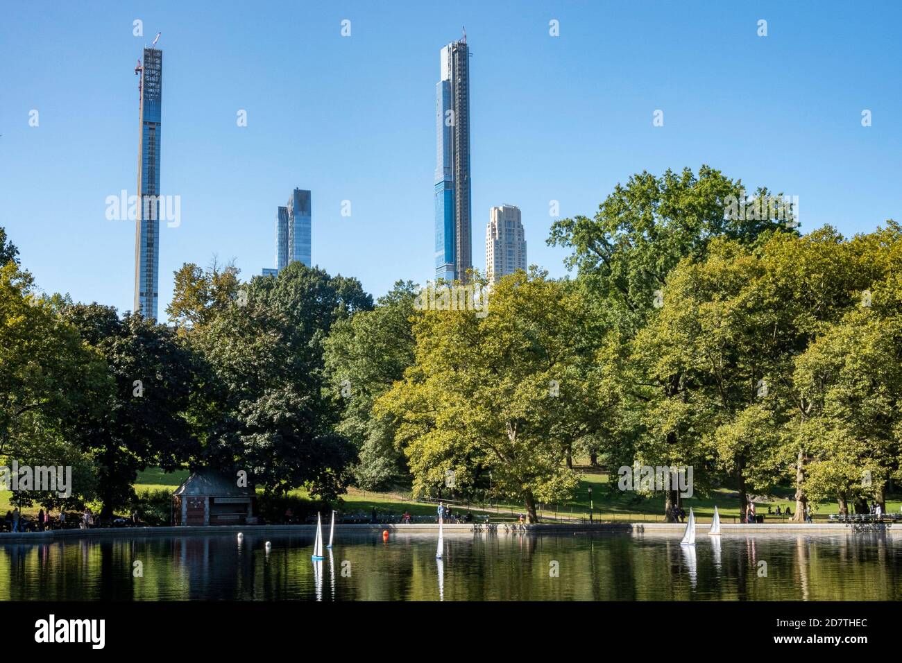 Conservatory Water in Central Park with supertall buildings in the ...