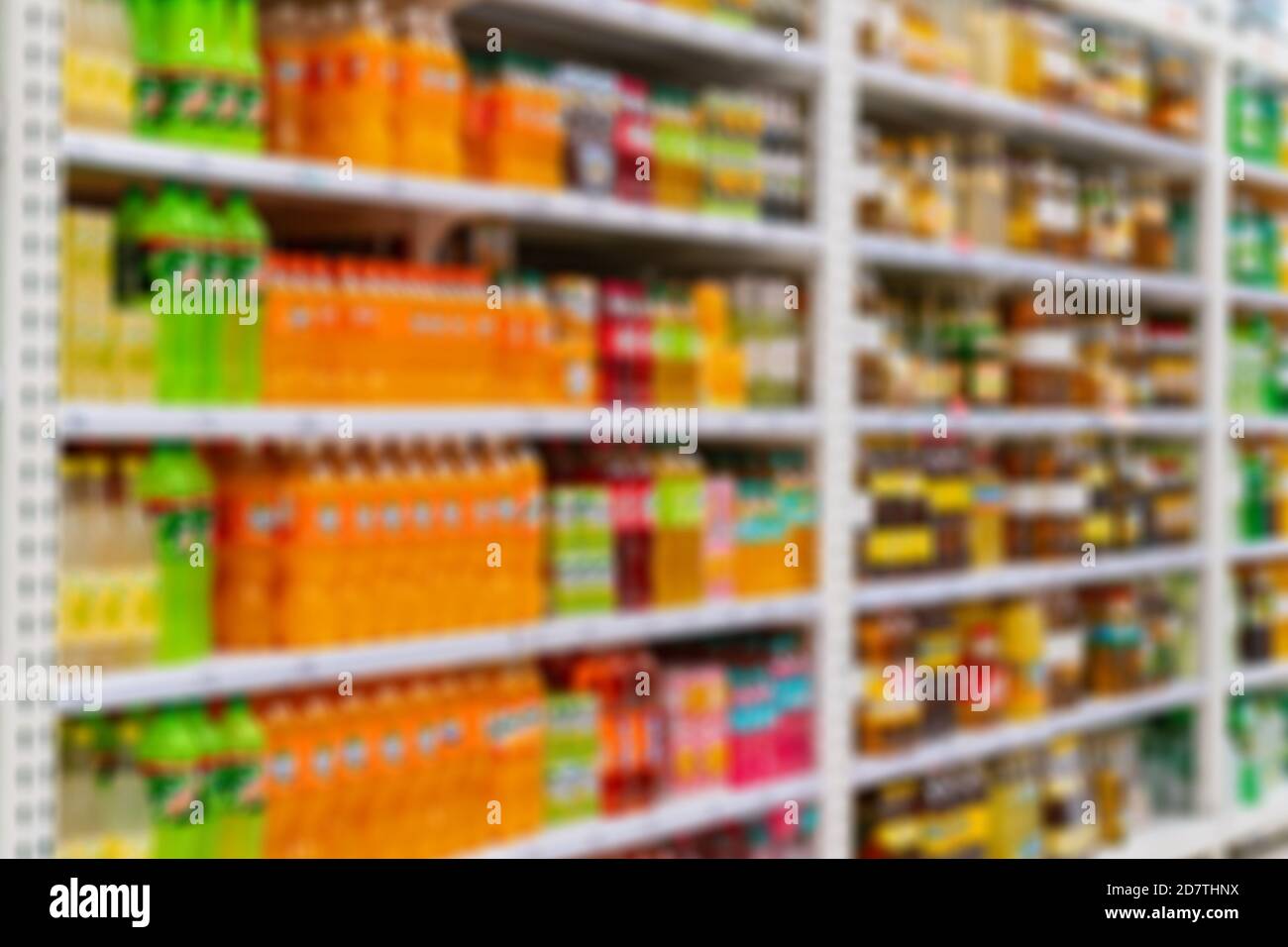 Blurred supermarket. Selling goods in a retail store. Blurred ...
