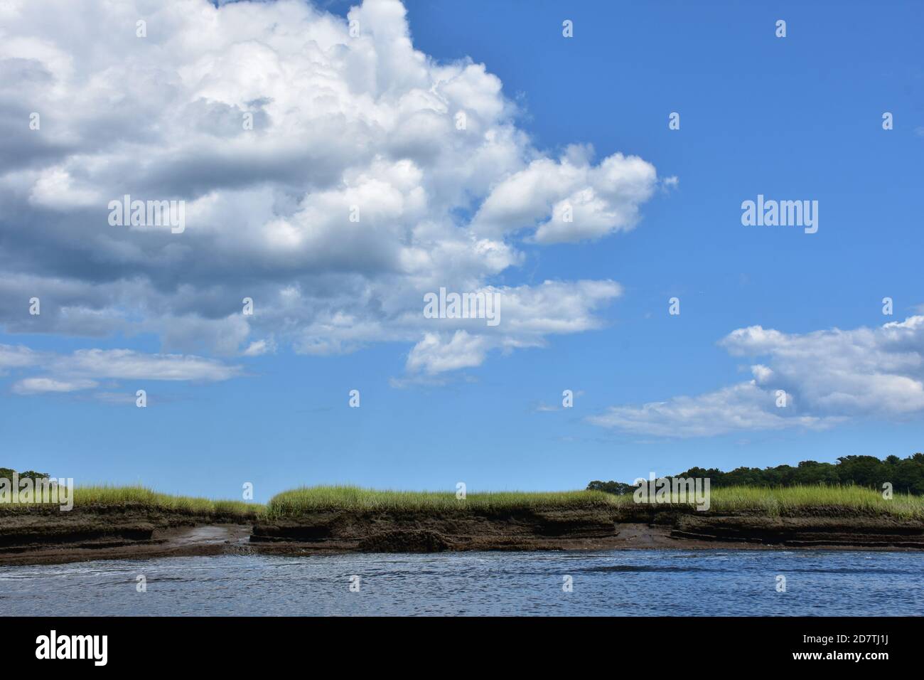 Beautiful river landscape with a marsh and tidal river Stock Photo - Alamy