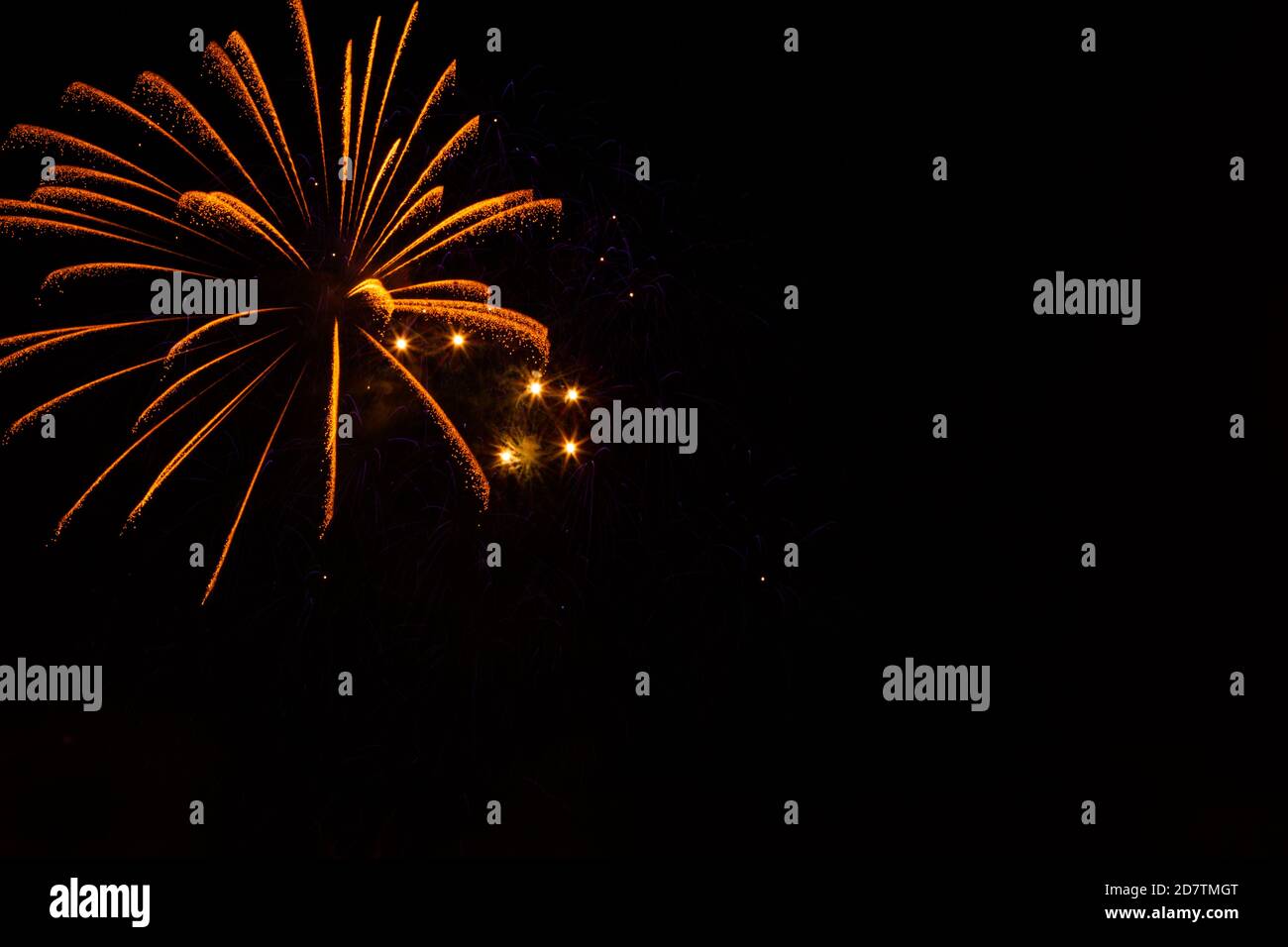 Night sky with fireworks display golden upper left corner Stock Photo ...