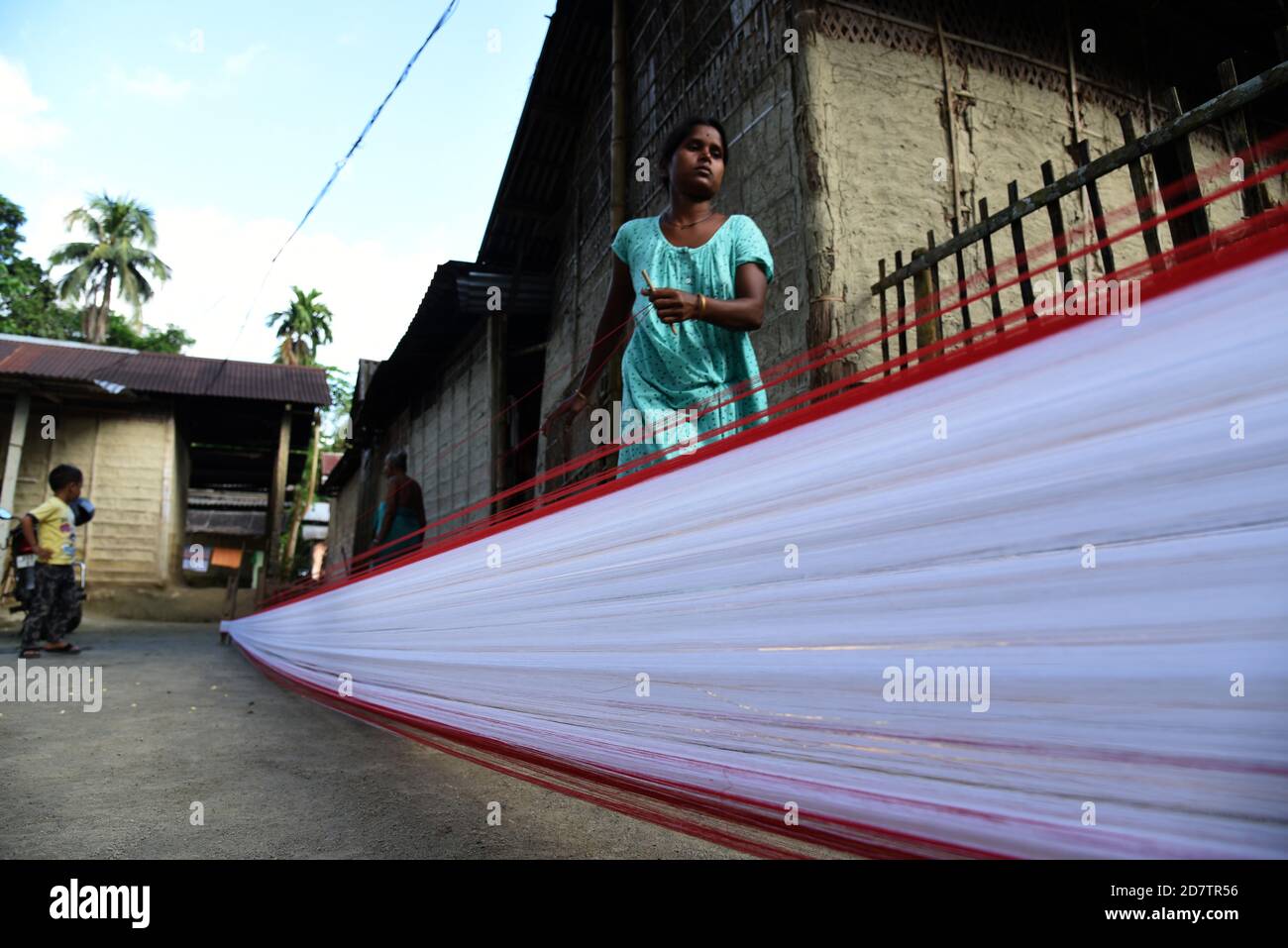 Guwahati, Assam, India. 25th Oct, 2020. An Assamese woman preparing to ...