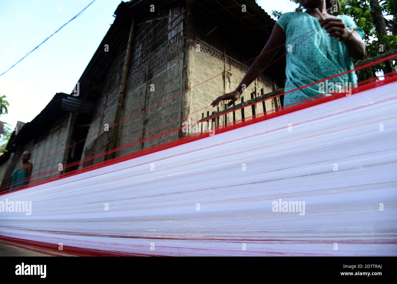 Guwahati, Assam, India. 25th Oct, 2020. An Assamese woman preparing to ...