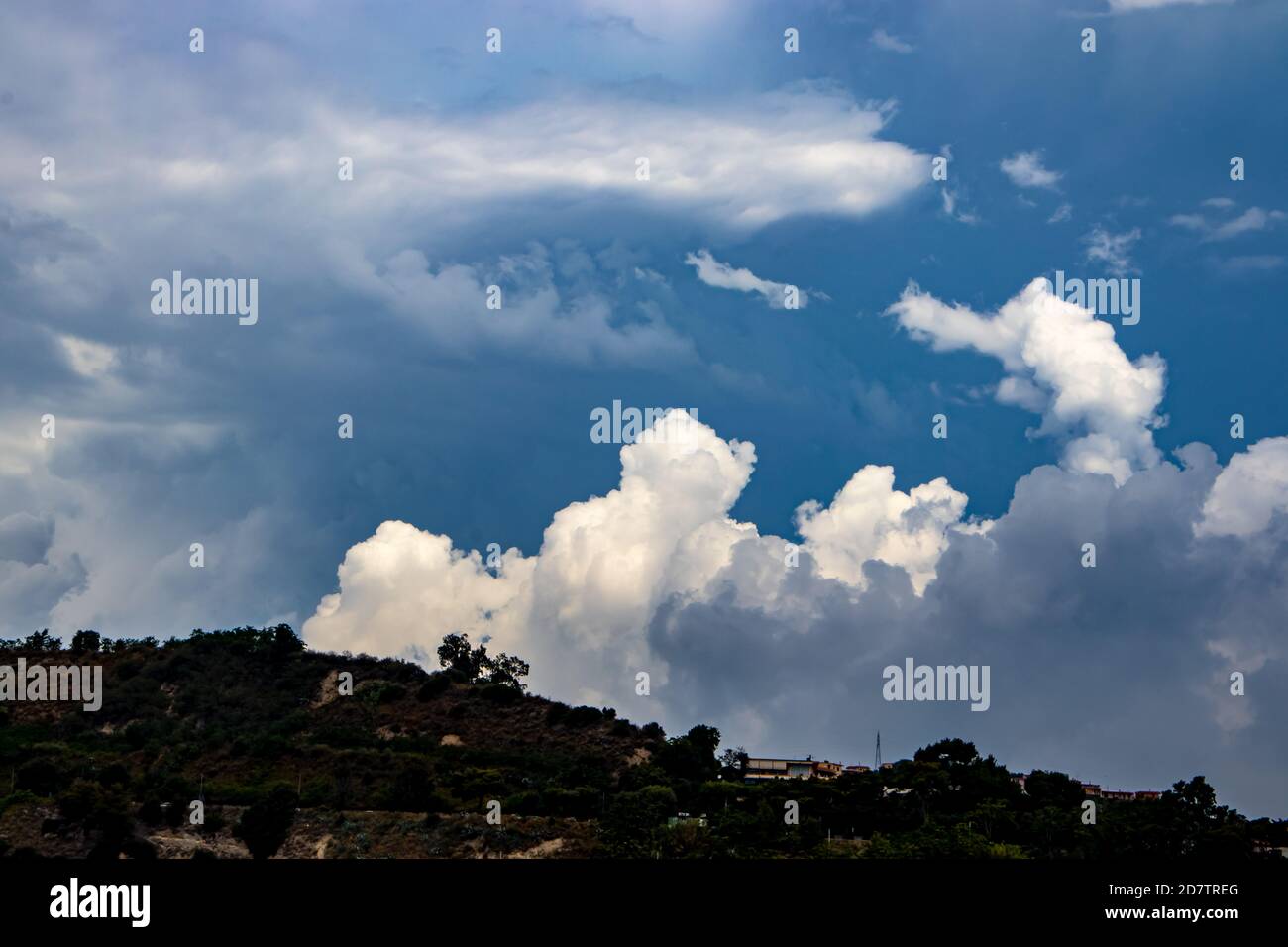 The blue sky in the background makes the cloud stand out. The cloud ...