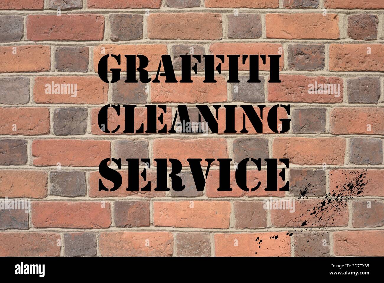 Graffiti cleaning service brick wall Stock Photo - Alamy