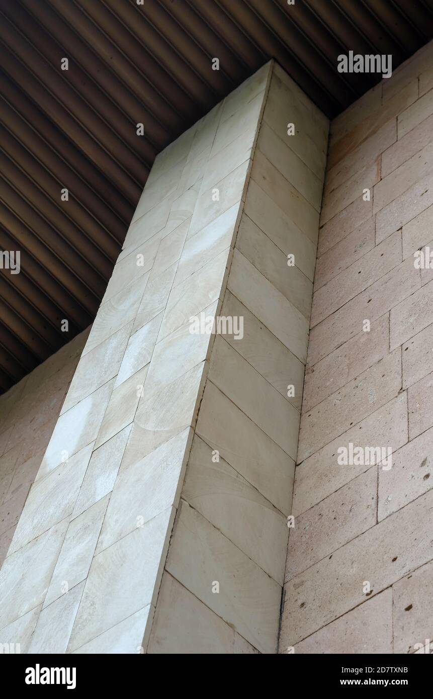 Abstract architectural composition. High building facade faced with ...