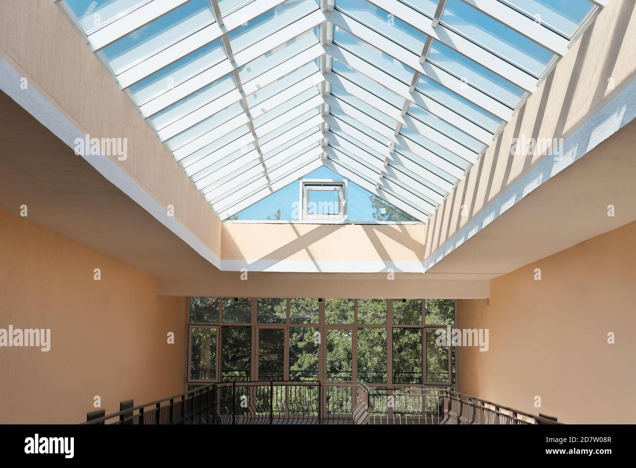 Transparent glass roof on top of a modern building. Corporate building ...