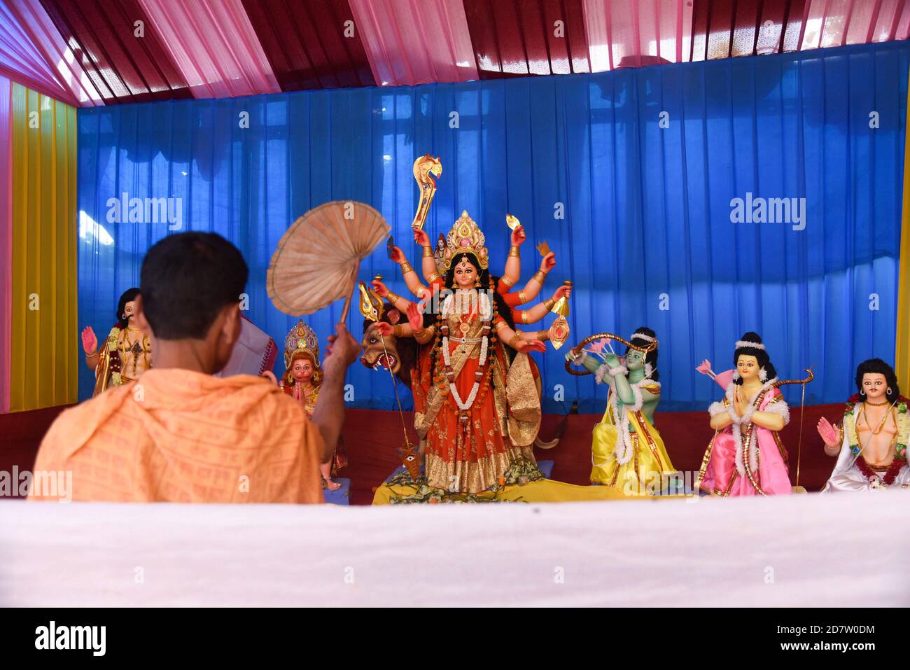 Indian priest performing puja hi-res stock photography and images - Alamy