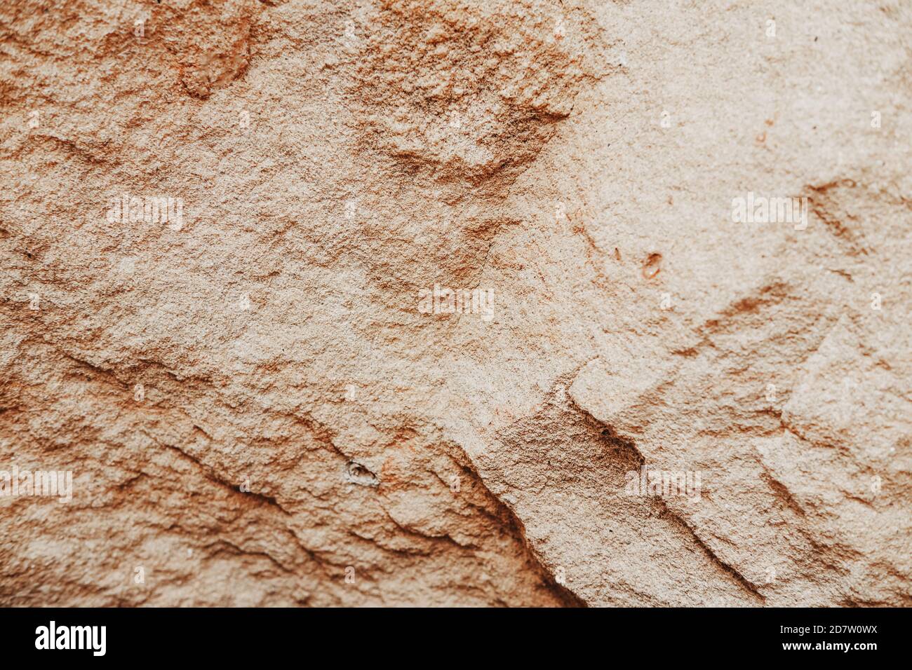 Details of sand stone texture with orange tint, close up shot of rock ...