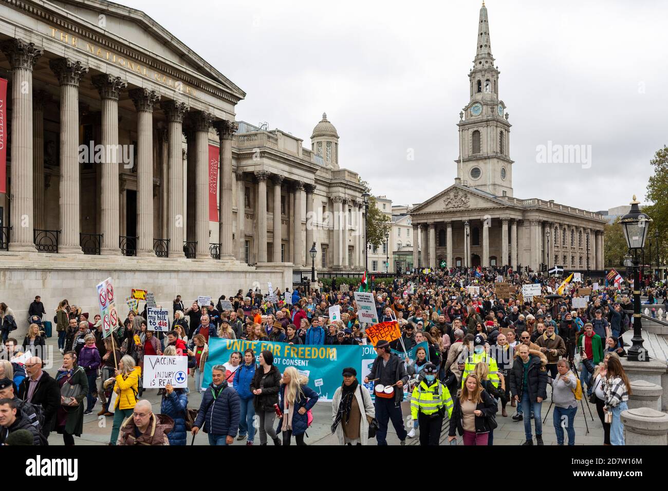 Crowd marching through Trafalgar Square during an anti-lockdown rally ...