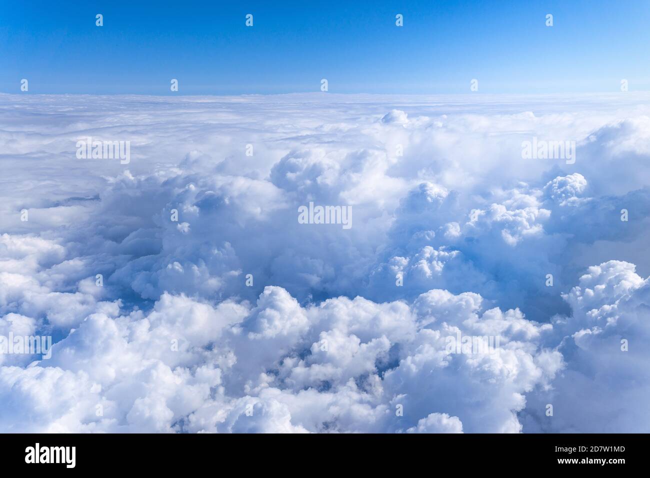 Aerial view flying above clouds in the atmosphere, depicts heaven ...