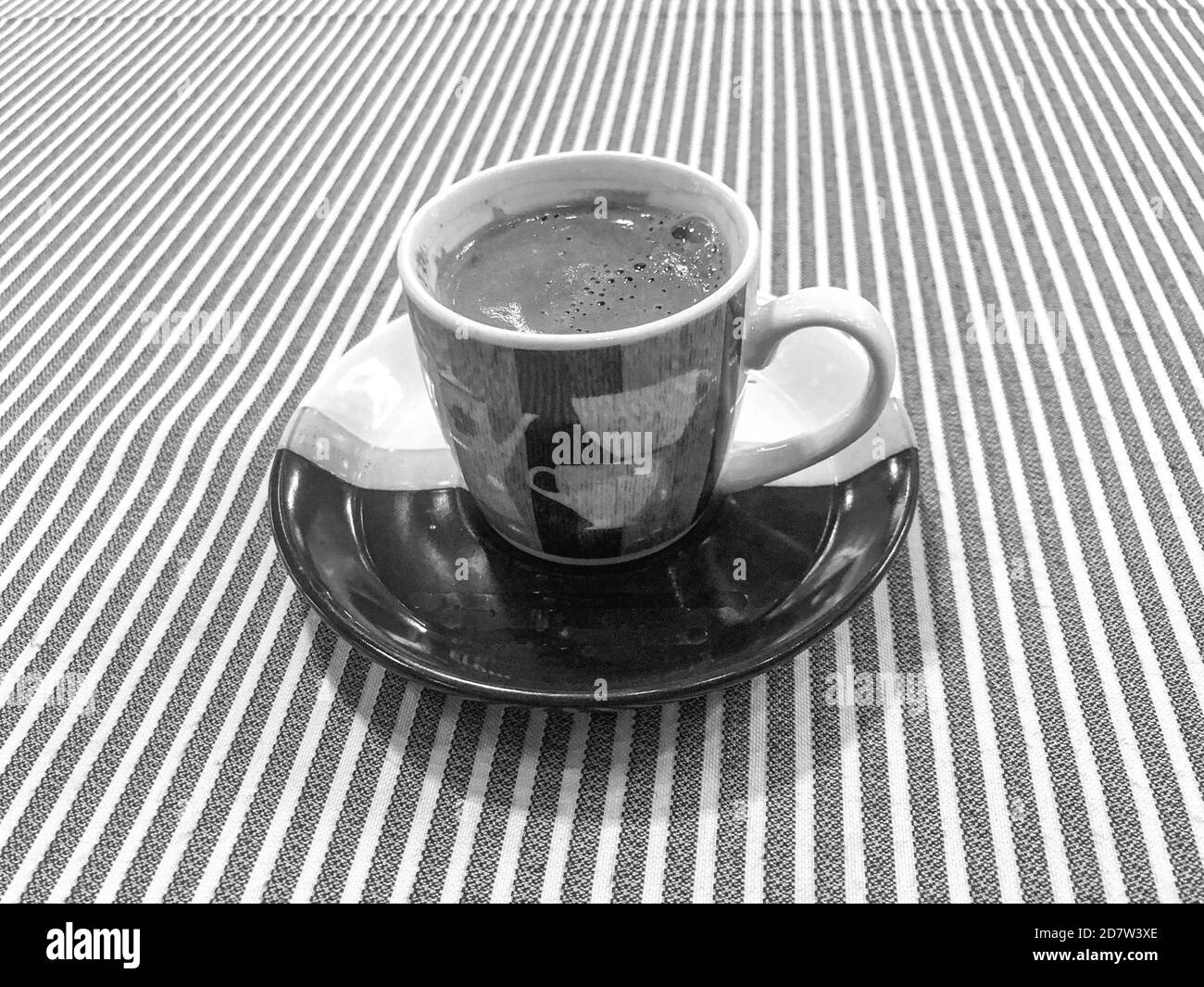 Strong, aromatic Greek coffee with the sludge of coffee grounds at the ...