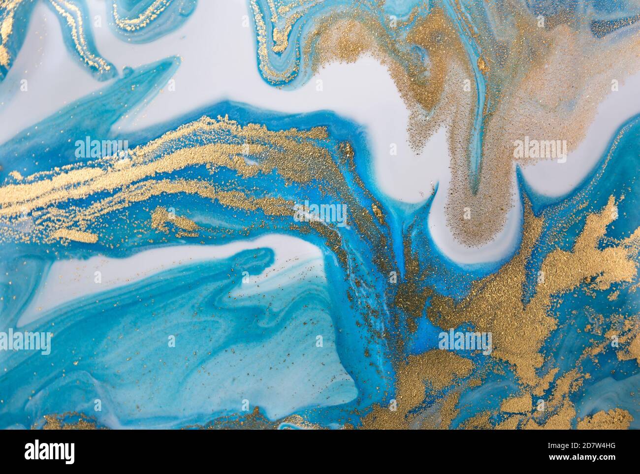Blue wave pattern with layers of gold sequins Stock Photo - Alamy