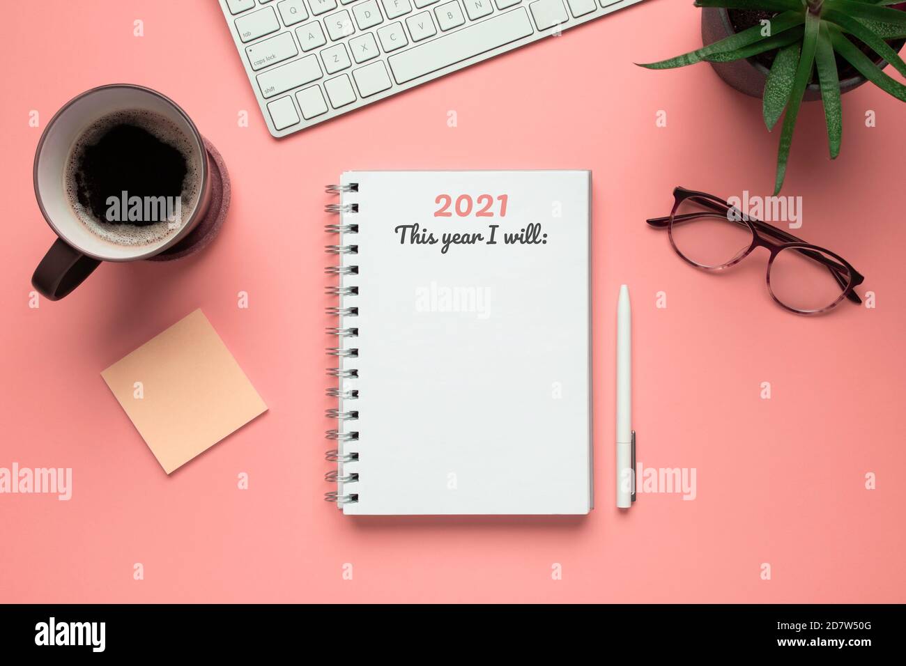 Stock photo of 2021 new year notebook ready to write goals, on a pink ...