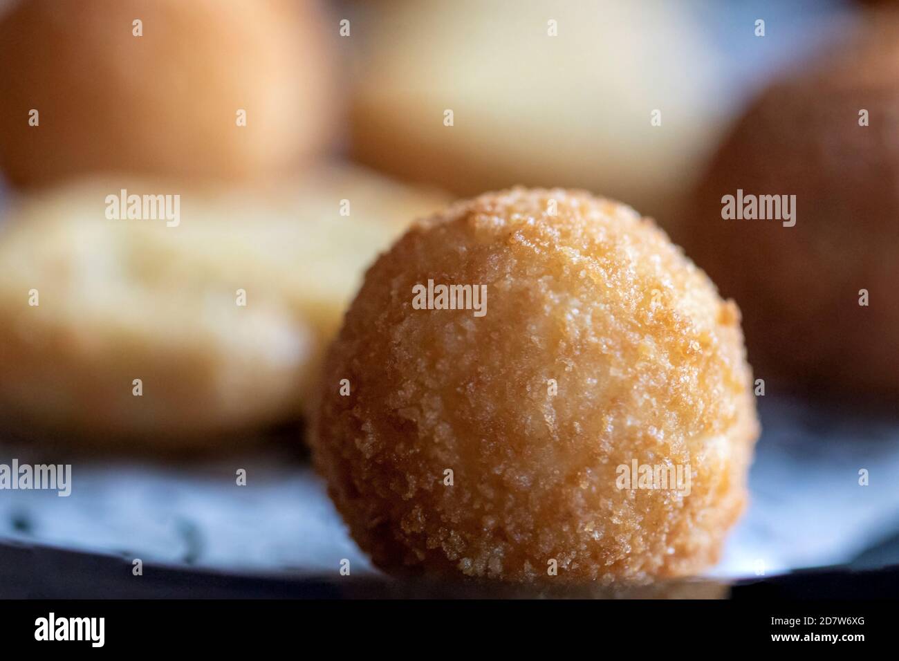 A close up portrait of a Dutch delicacy called a bitterbal, which is a ...