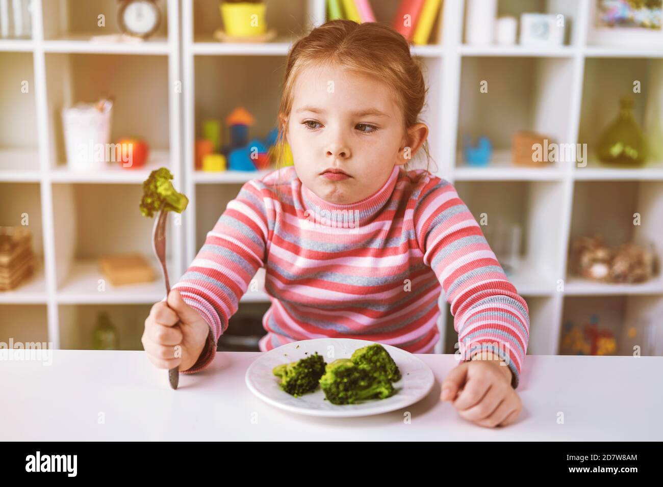 Child broccoli fork hi-res stock photography and images - Alamy