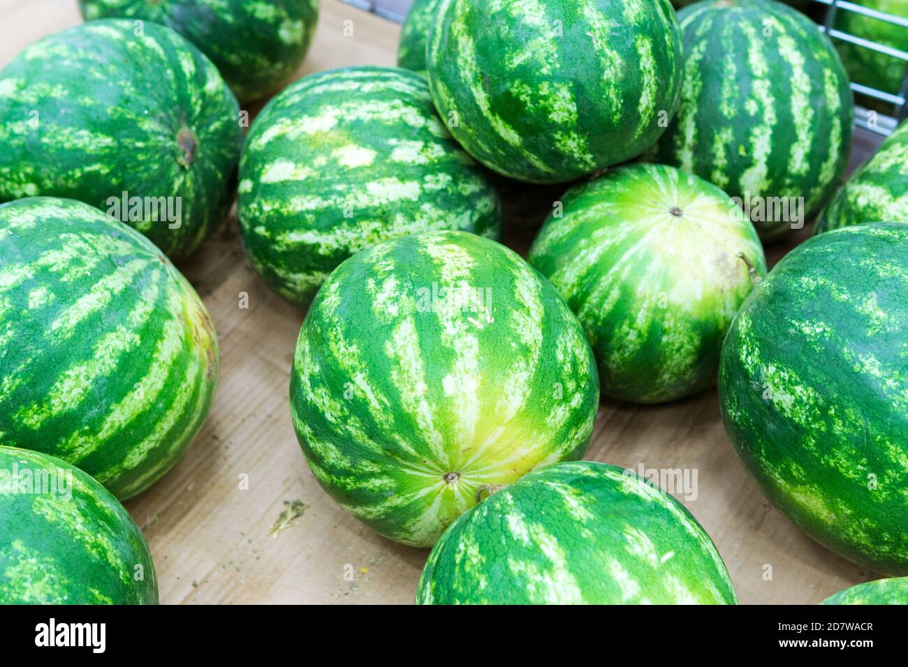 Watermelons on supermarket shelf. Summer Fruits. Fresh organic water ...