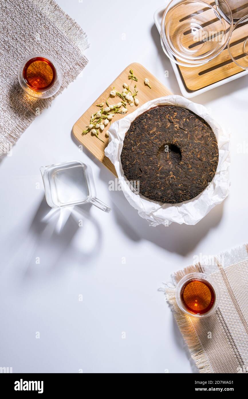 pressed Chinese Shu pu-erh tea. tea ceremony top view, flat lay. healthy food healthy drinks ...