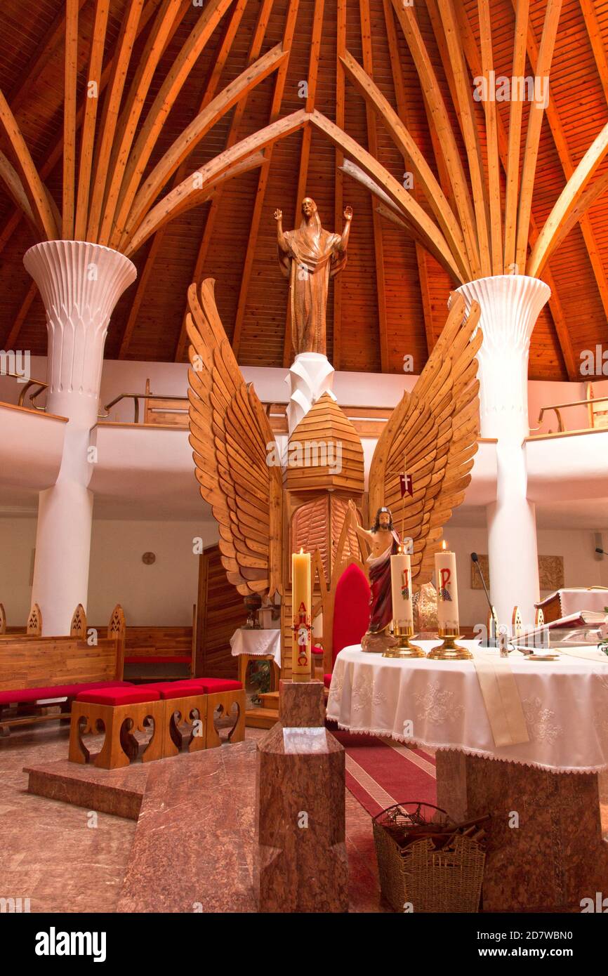 In the Millennium Church, the shape of the winged altar is reminiscent ...