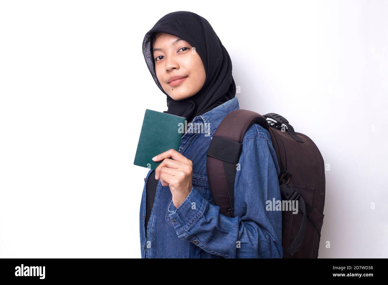 Asian muslim woman hijab backpacker holding passport isolated on white ...