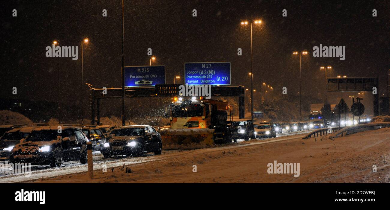 View of the crowded M27 motorway during a sudden snow storm, Portsmouth ...