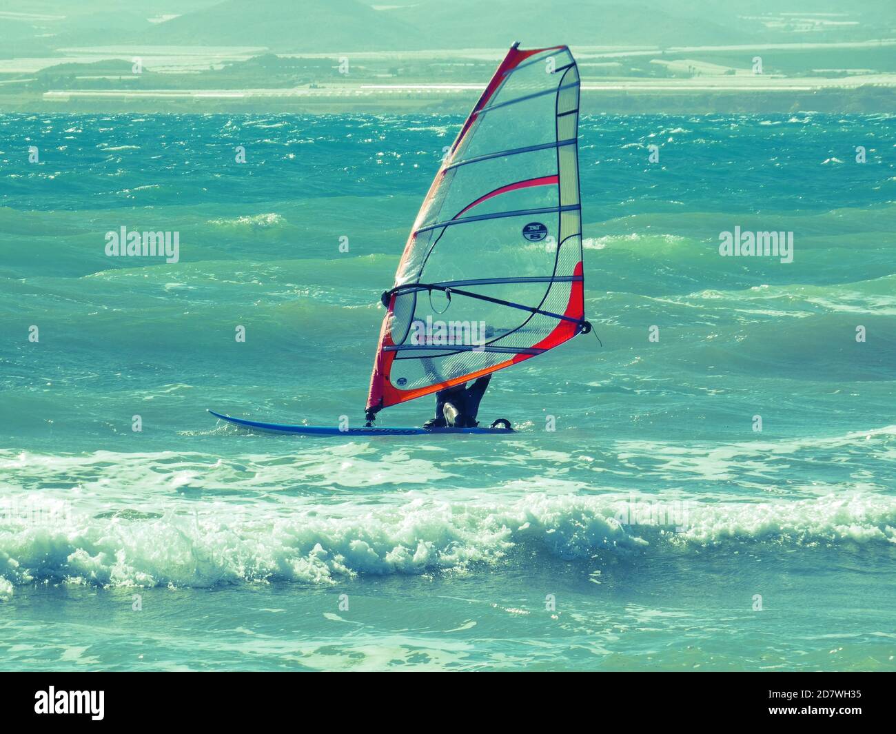 Wind surfer in action Stock Photo - Alamy