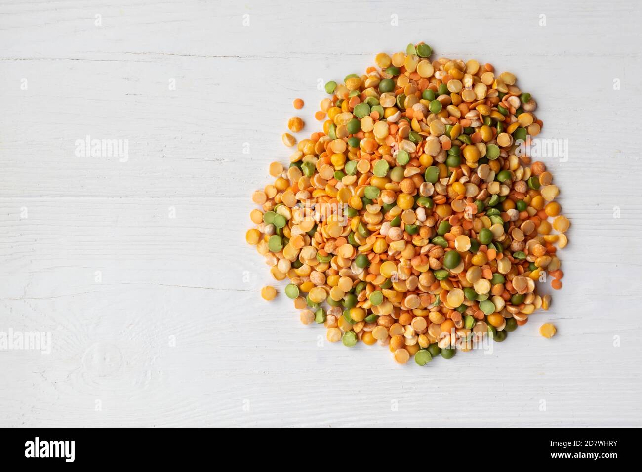 Dry peas of different colors close-up on a light background. Layout for ...