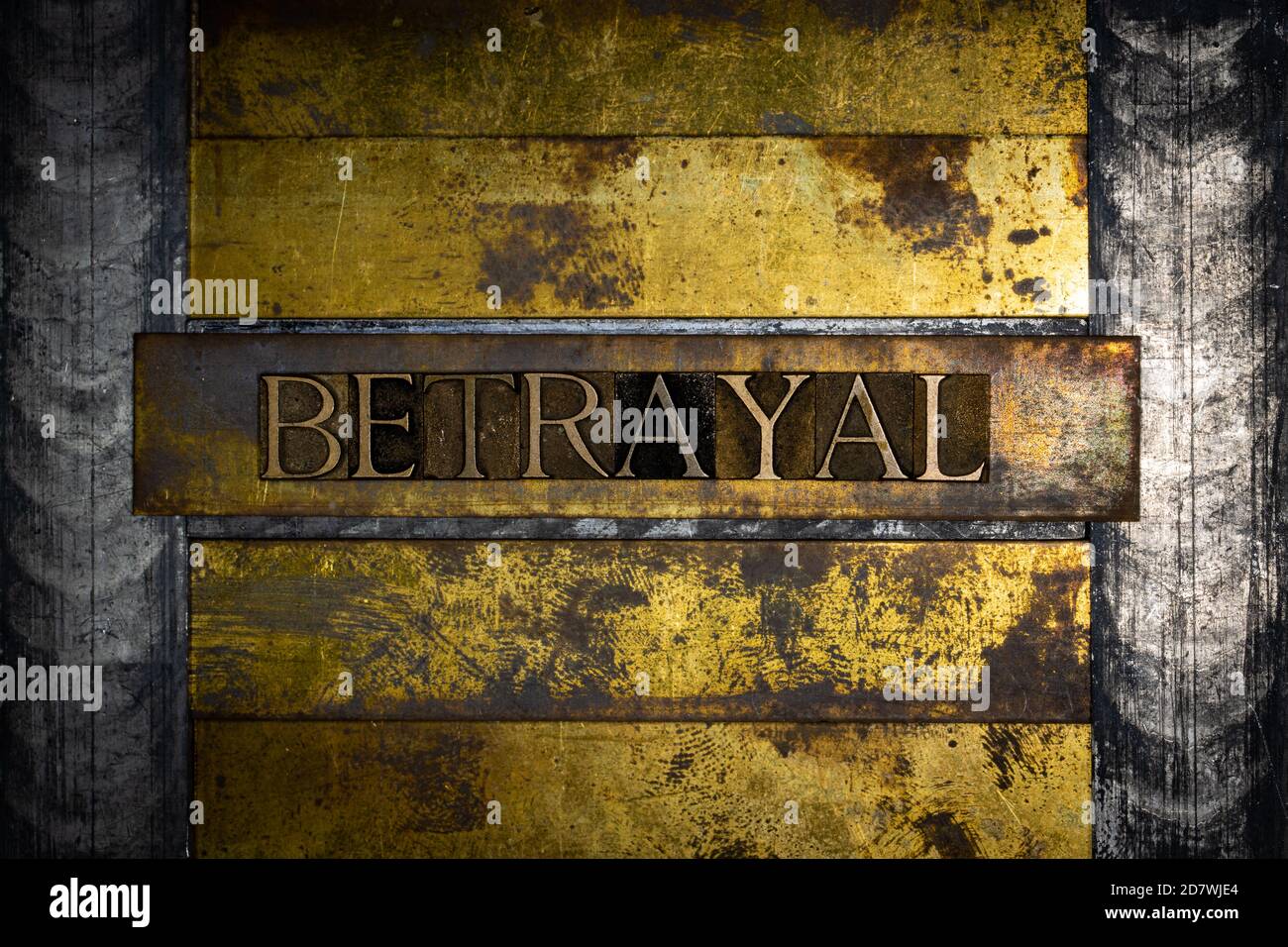 Betrayal text message on textured grunge copper and vintage gold ...
