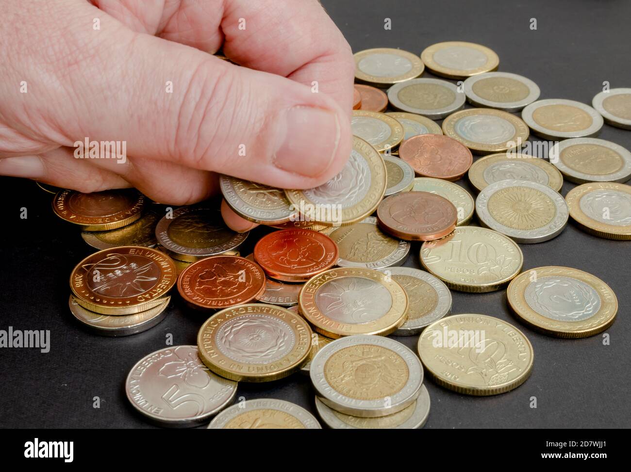Different argentine coins stacked. Pile of money. Metal coins texture ...