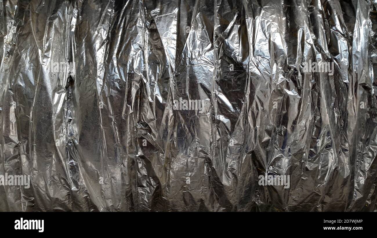 Crumpled foil. Background of crumpled foil. Creative background Stock ...