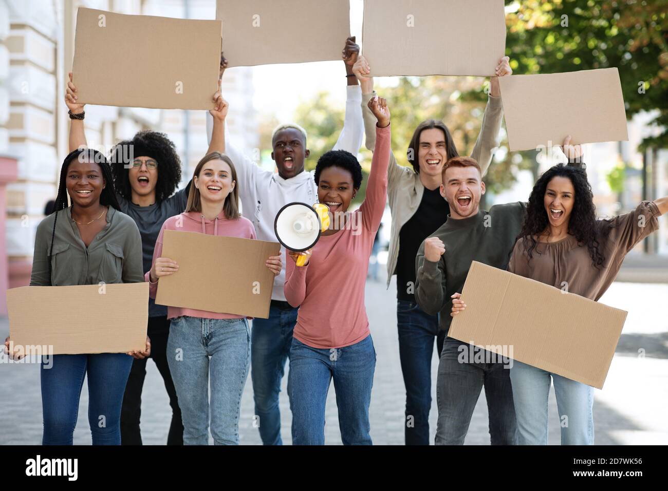Black motivated lady leading group of strikers Stock Photo - Alamy