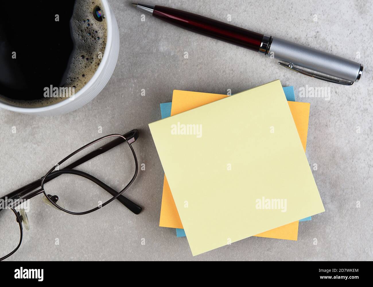Flat Lay still life of a business desk with Coffee Cup, sticky notes ...