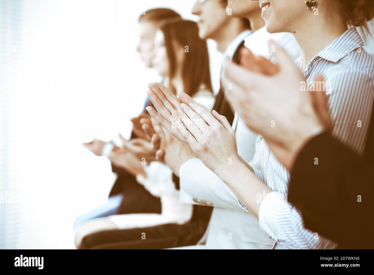 Business people clapping and applause at meeting or conference, close ...