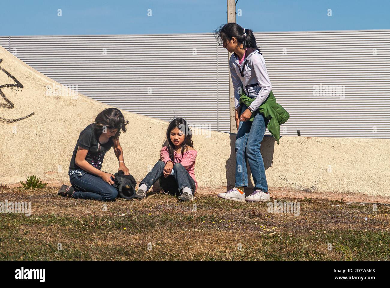 Punta Arenas, Chile - December 12, 2008: Three young girls hang out ...
