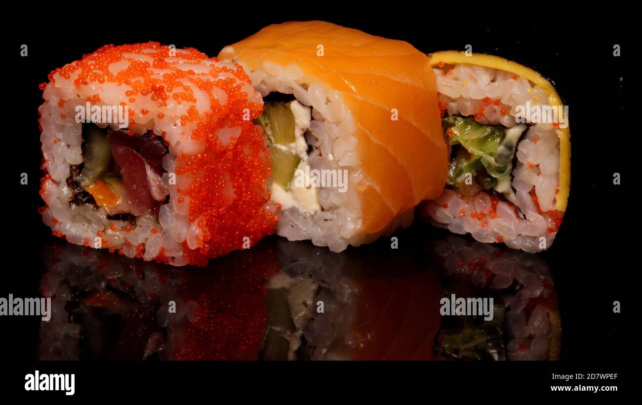 Set of three sushi rolls. Traditional japanese food Stock Photo - Alamy