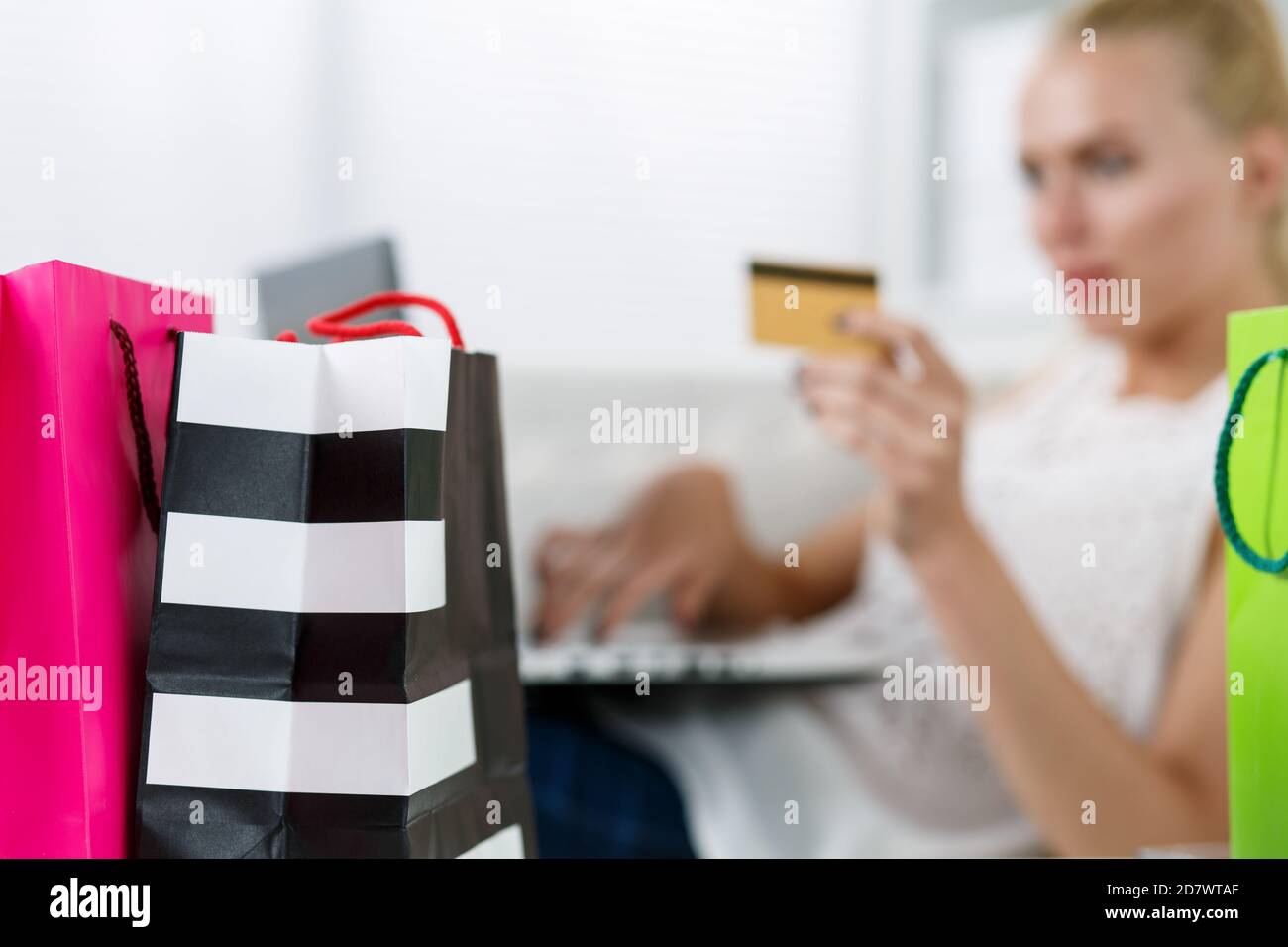 Blond woman making purchasing via internet paying credit card Stock ... Blond woman making purchasing via internet paying credit card Stock ...