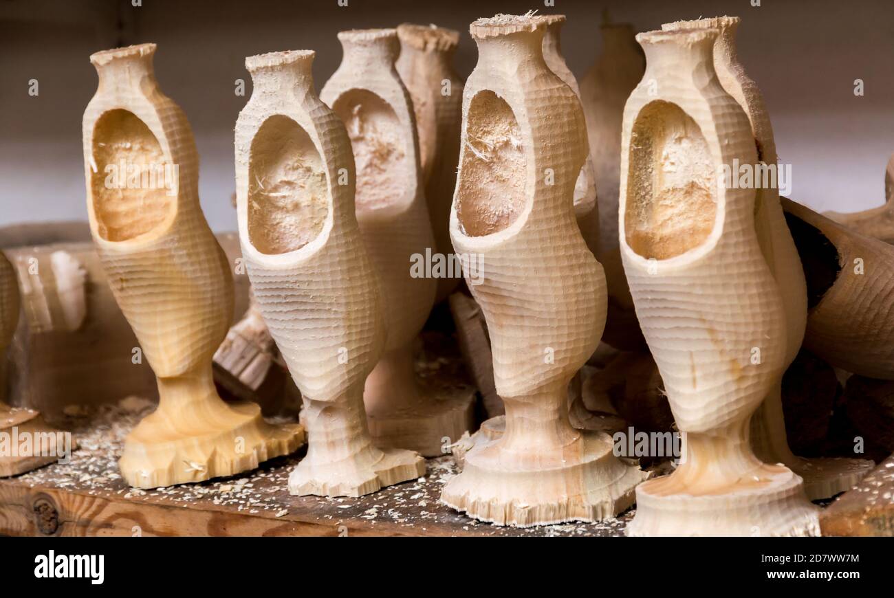 Wooden shoes manufactured and carved out of wood blocks in Holland are ...