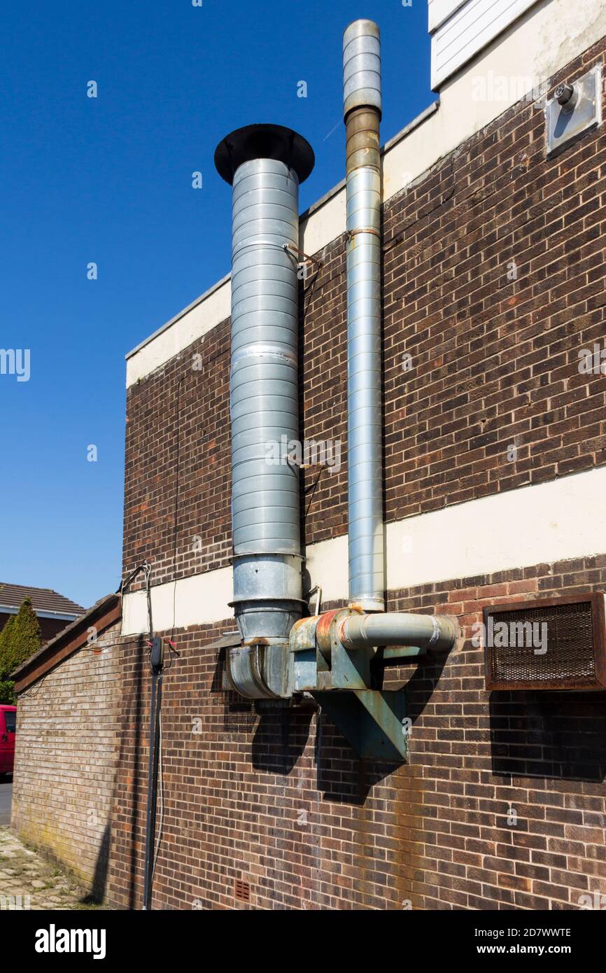Commercial kitchen ventilation equipment fitted to the external wall of ...