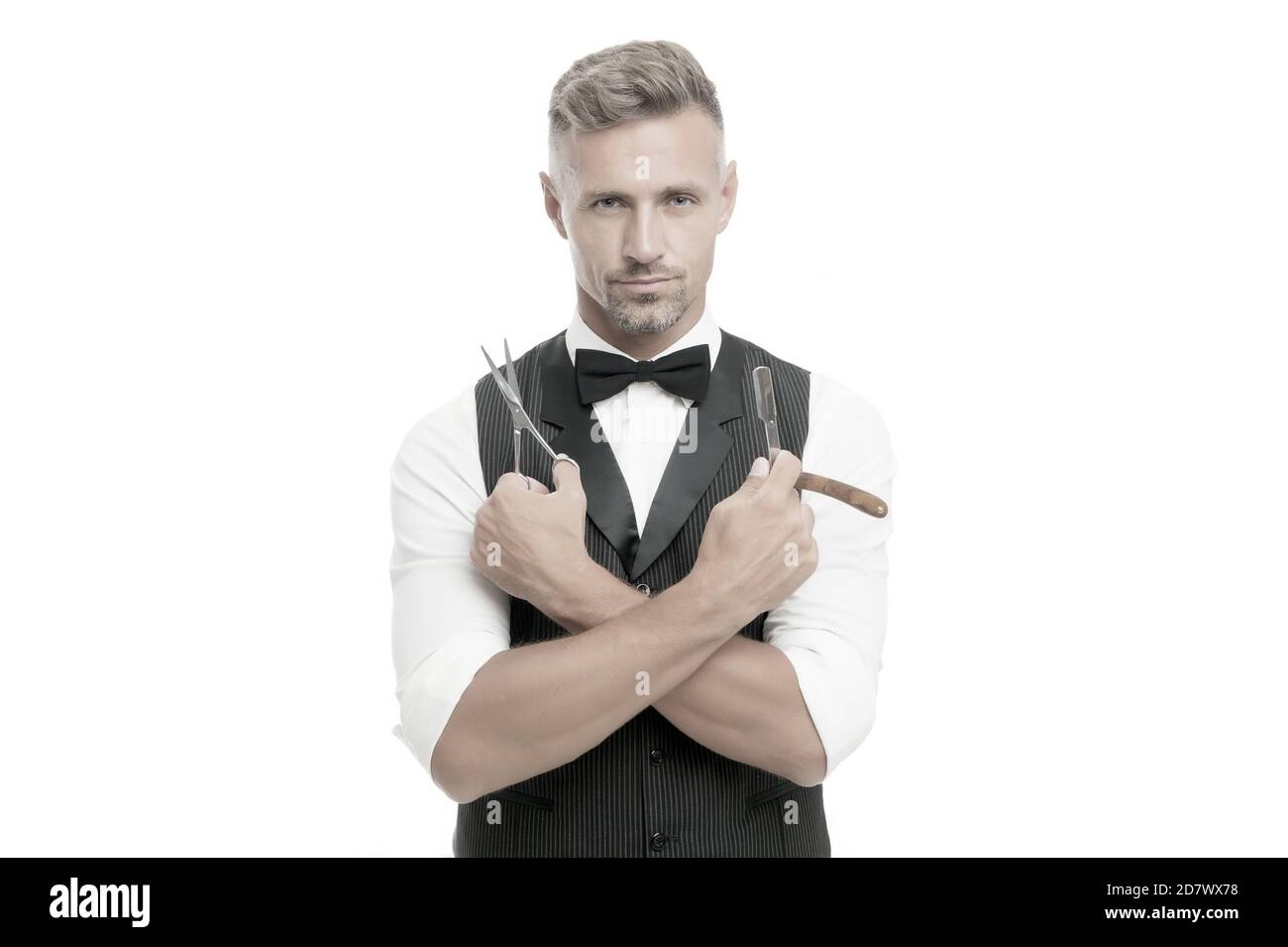 Vintage barber hairdresser. Barber in bow tie hold hairdresser ...