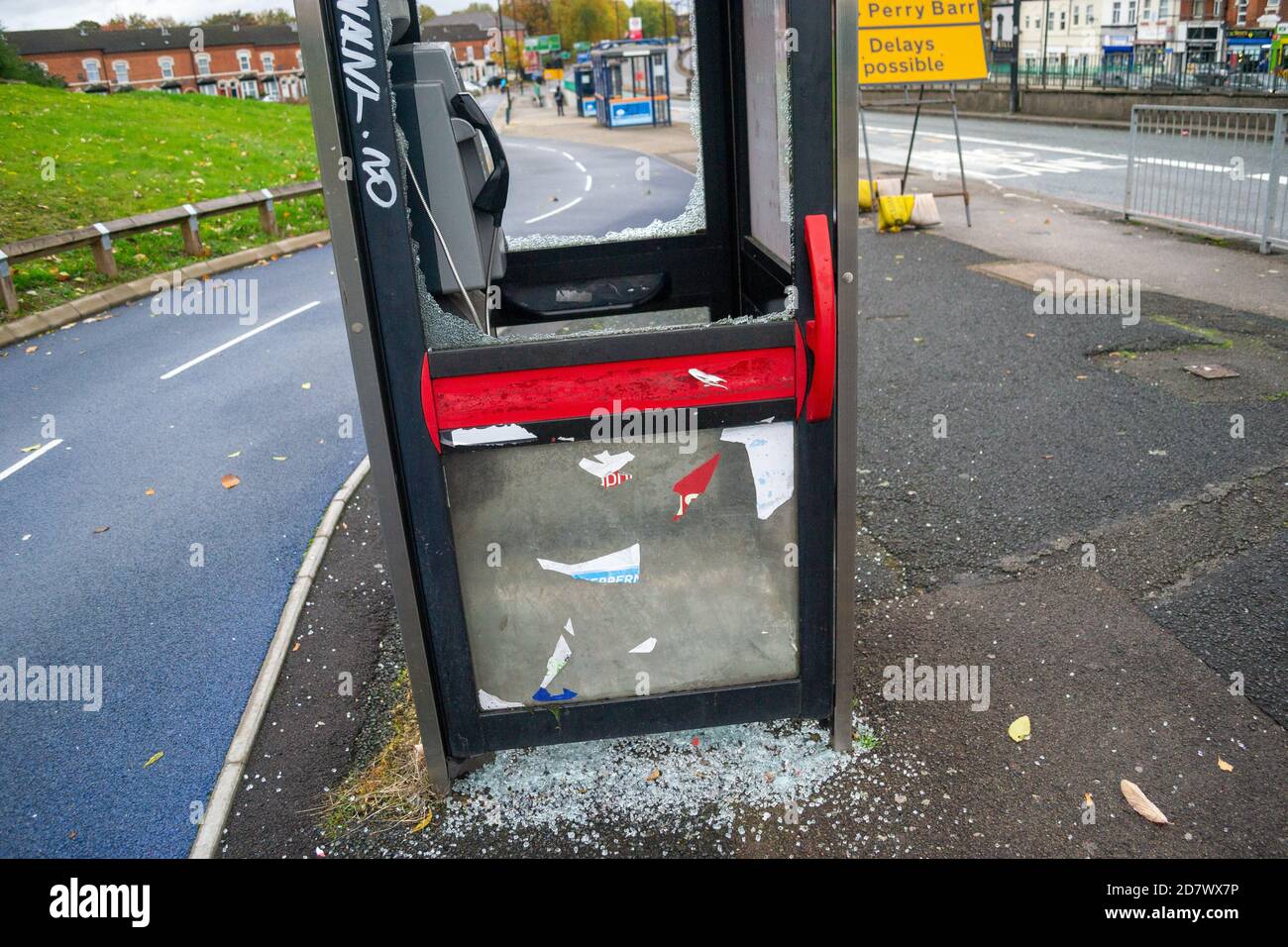 Smashed up, vandalised British telephone box with broken glass Stock ...
