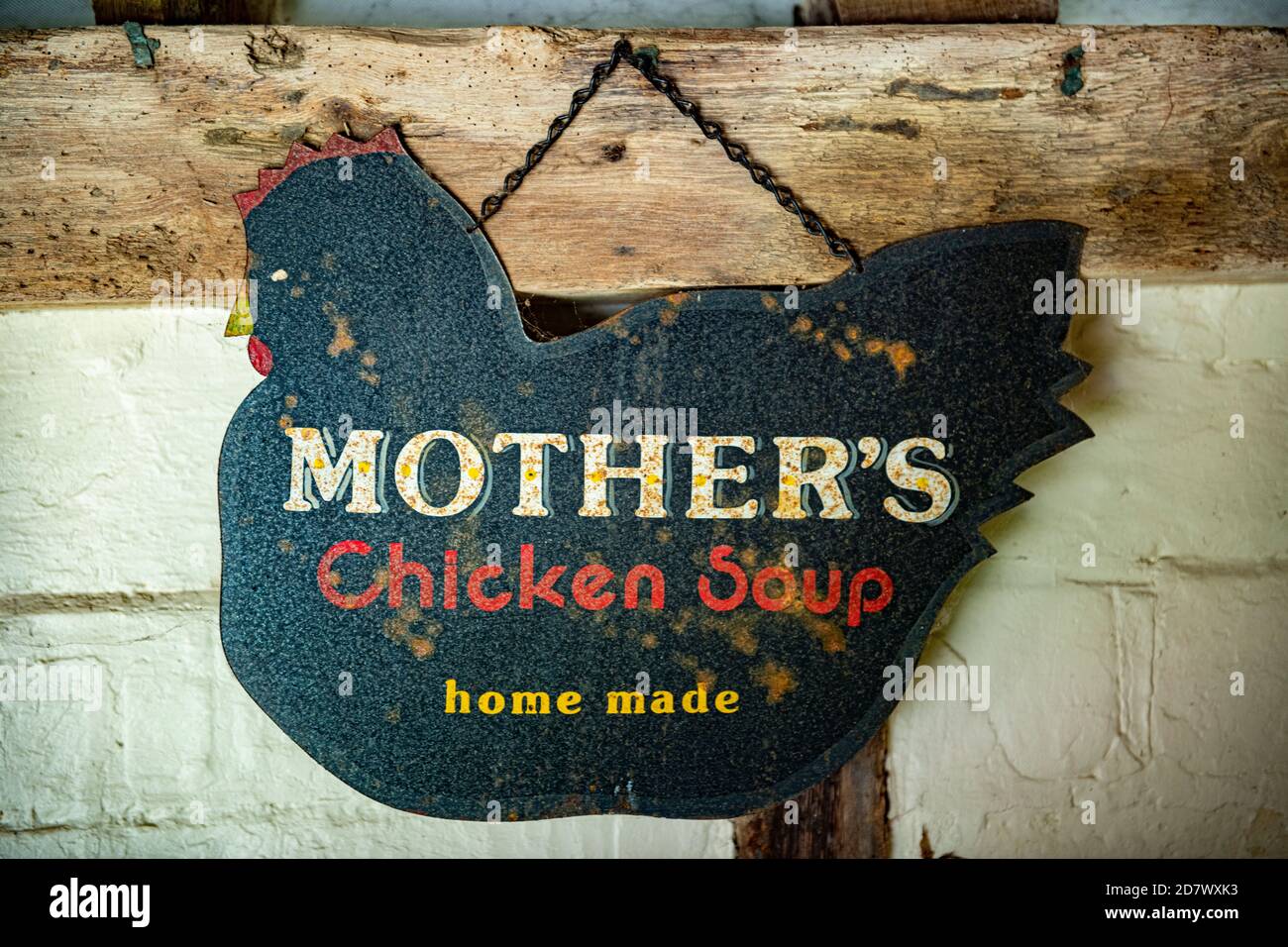 A rusty Mother's Chicken Soup sign Stock Photo - Alamy