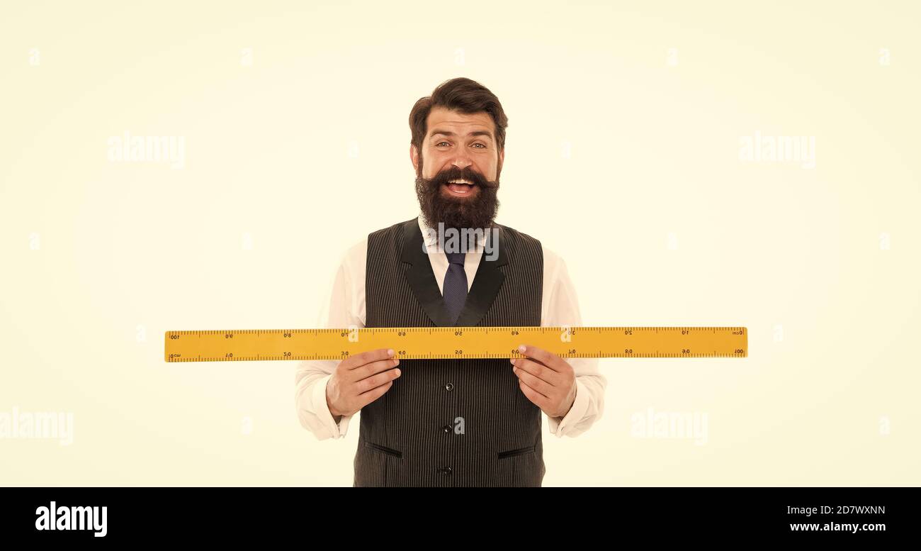Maths teacher taking measurement. this is too big. happy man measure ...