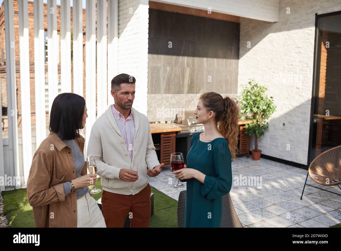 Women talking standing outdoors hi-res stock photography and images - Alamy