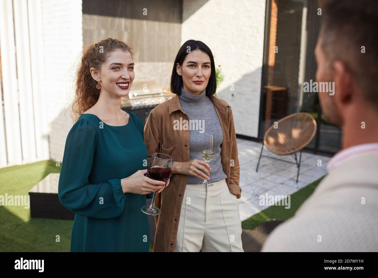 Women talking standing outdoors hi-res stock photography and images - Alamy