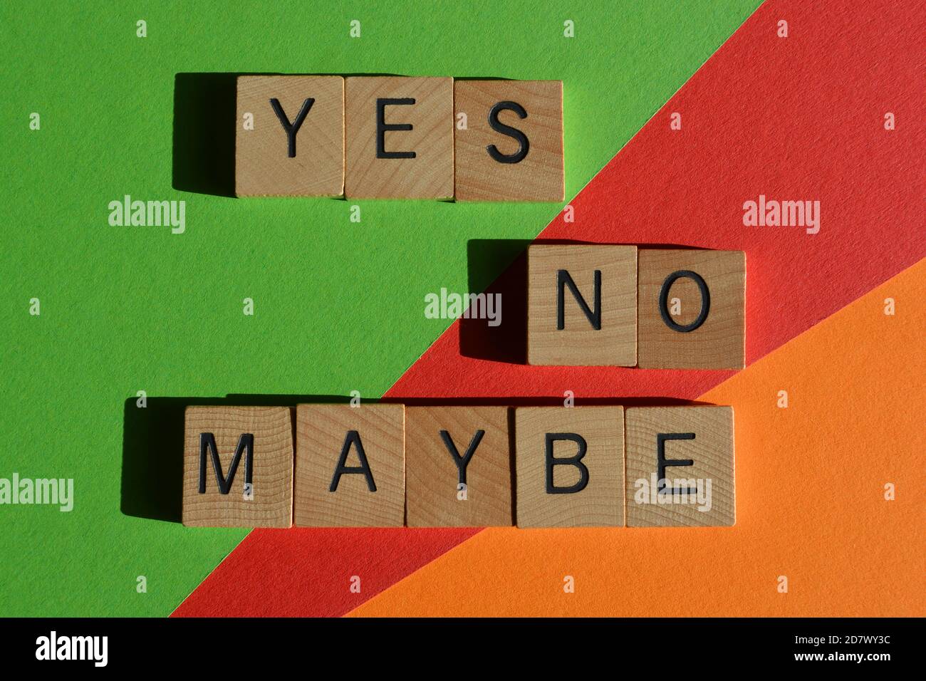 Yes, No, Maybe, words in wooden alphabet letters isolated on a ...